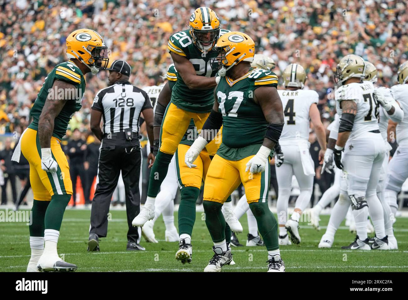 Green Bay Packers defensive tackle Kenny Clark (97) celebrates his sack ...