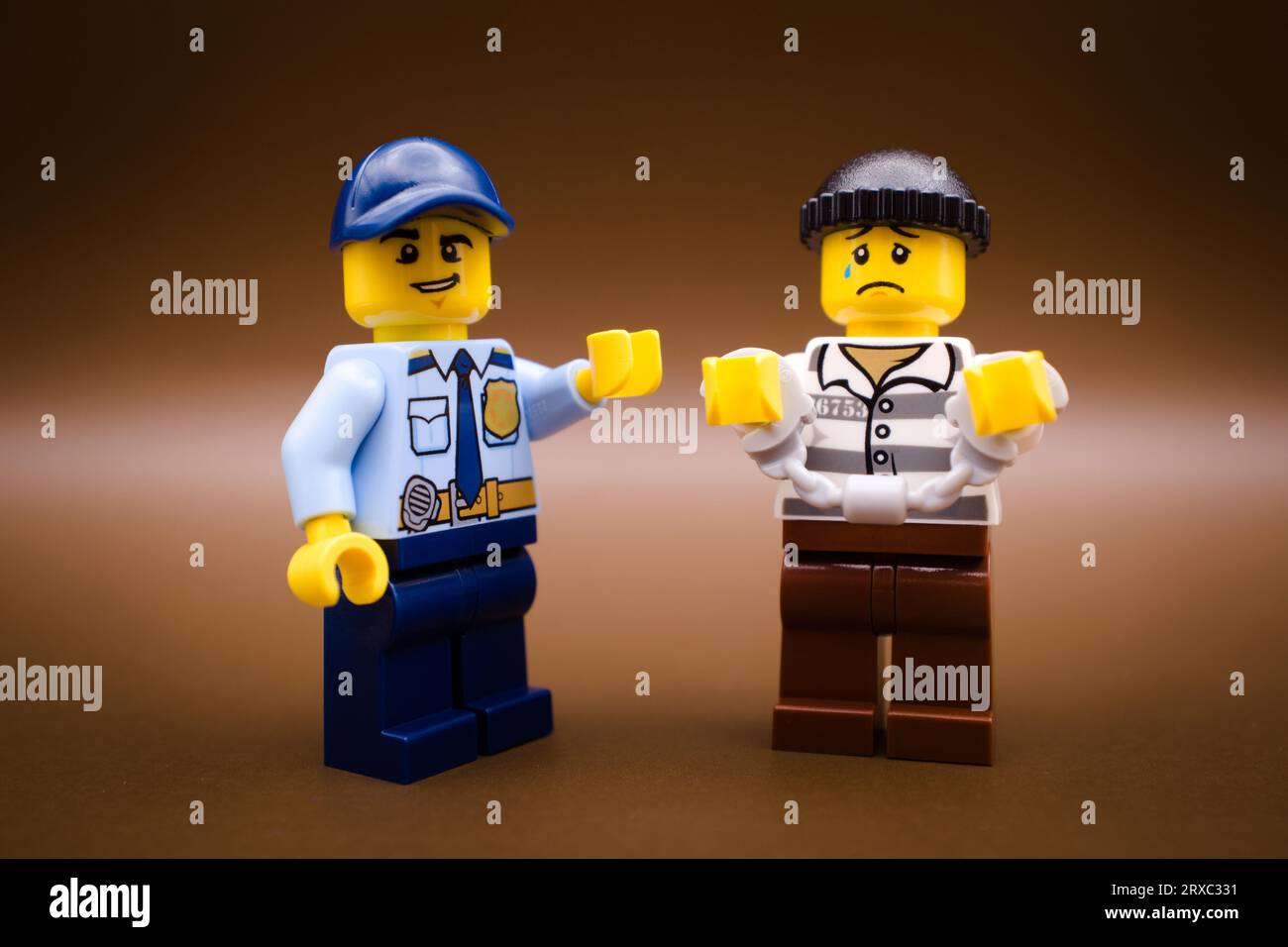 Policeman on duty, just caught a thief Stock Photo - Alamy