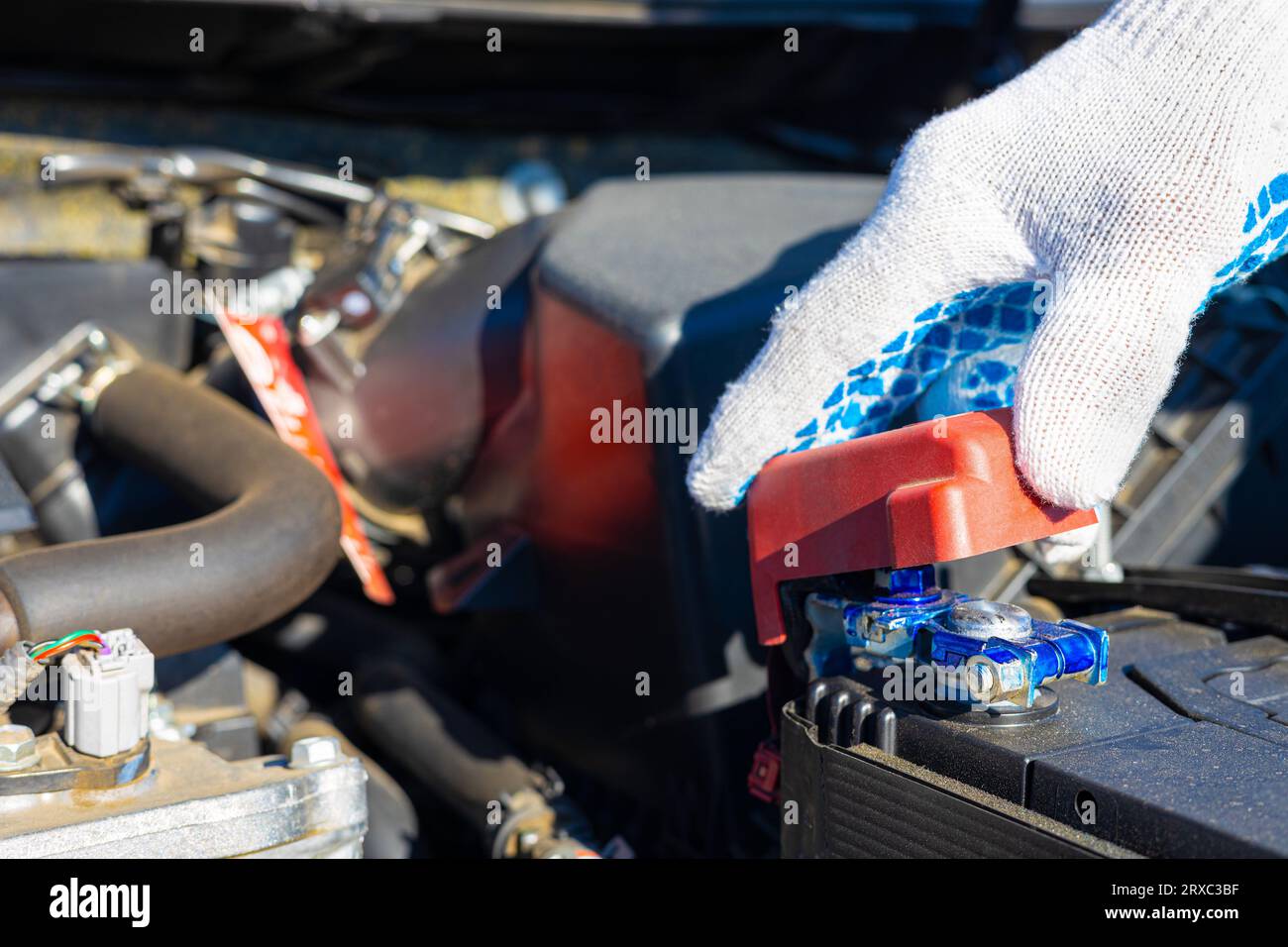 the master in the car service will check the battery terminal. car ...