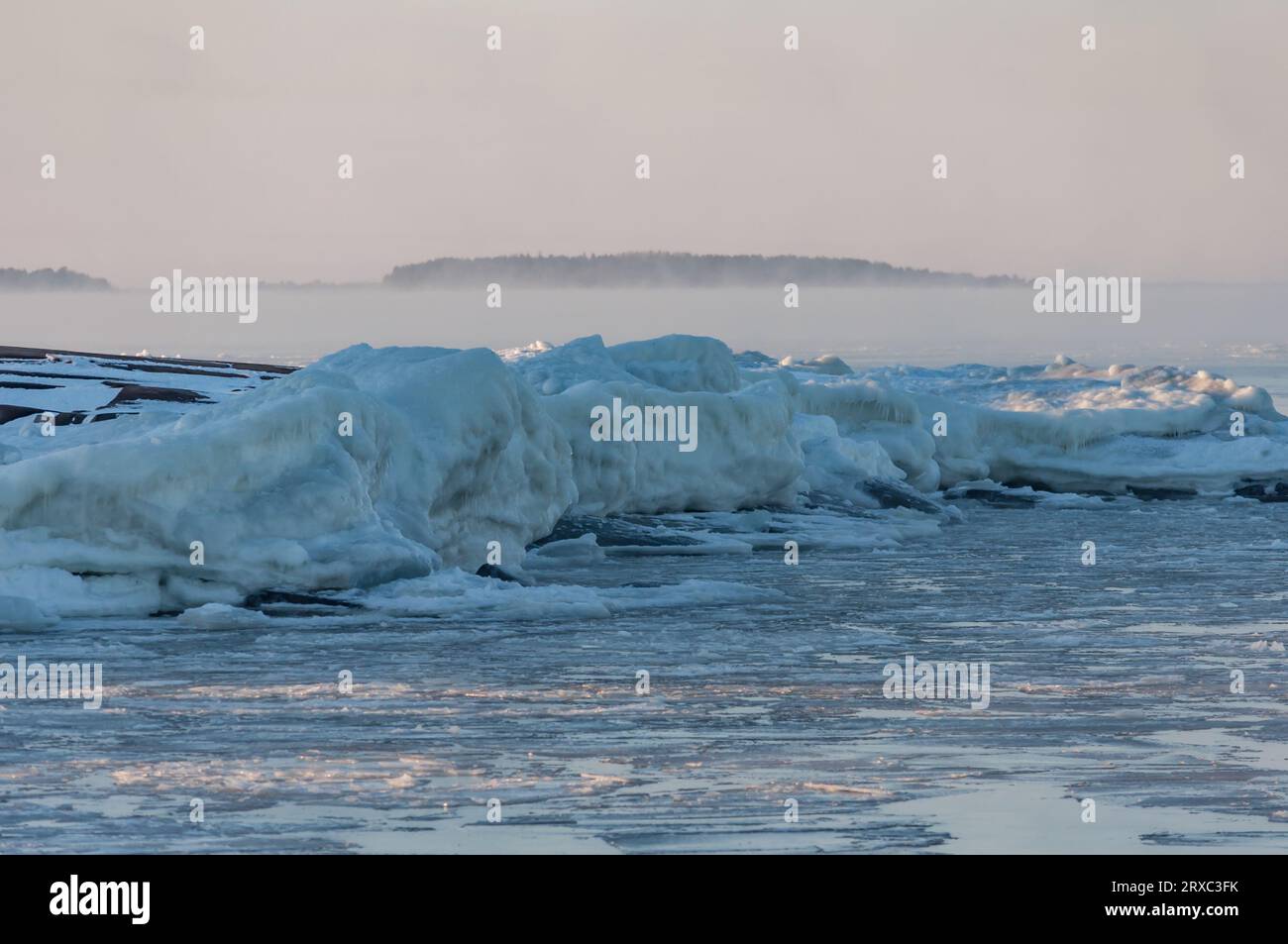 Frozen sea shore with icy fog and blocks of ice in Pori, Finland Stock ...