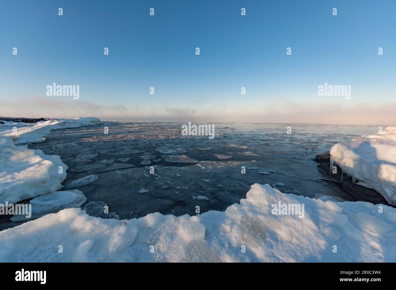 Cold sea with ice floating among the freezing fog in Pori, Finland ...