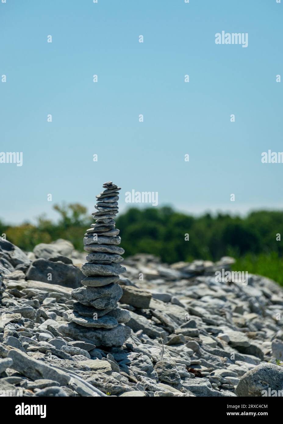 picture with beautiful white stone piles by the sea, these objects were ...