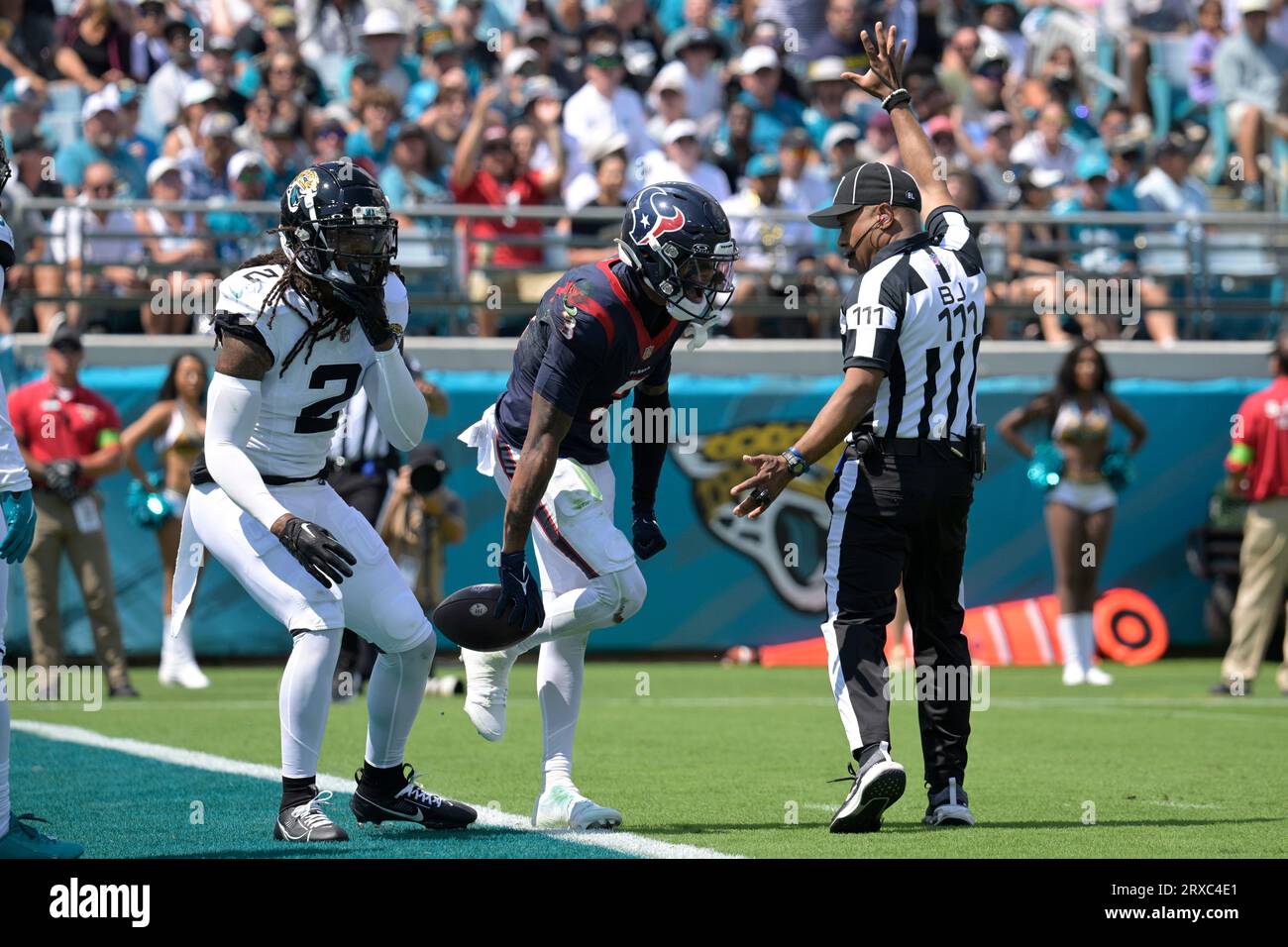 Houston Texans wide receiver Tank Dell (3) celebrates a catch in front ...