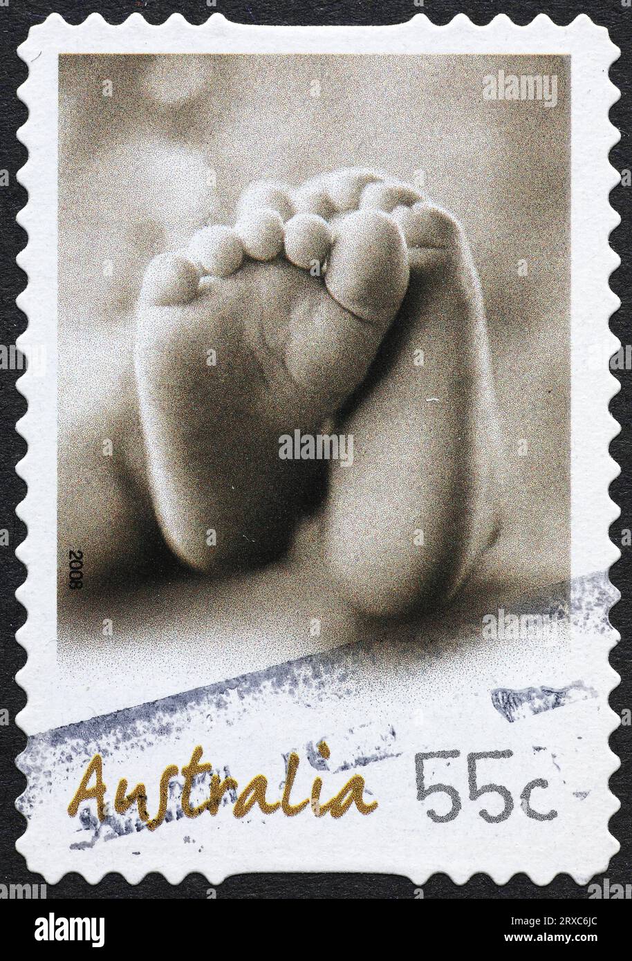 Human hand shaking a robotic hand on postage stamp Stock Photo - Alamy