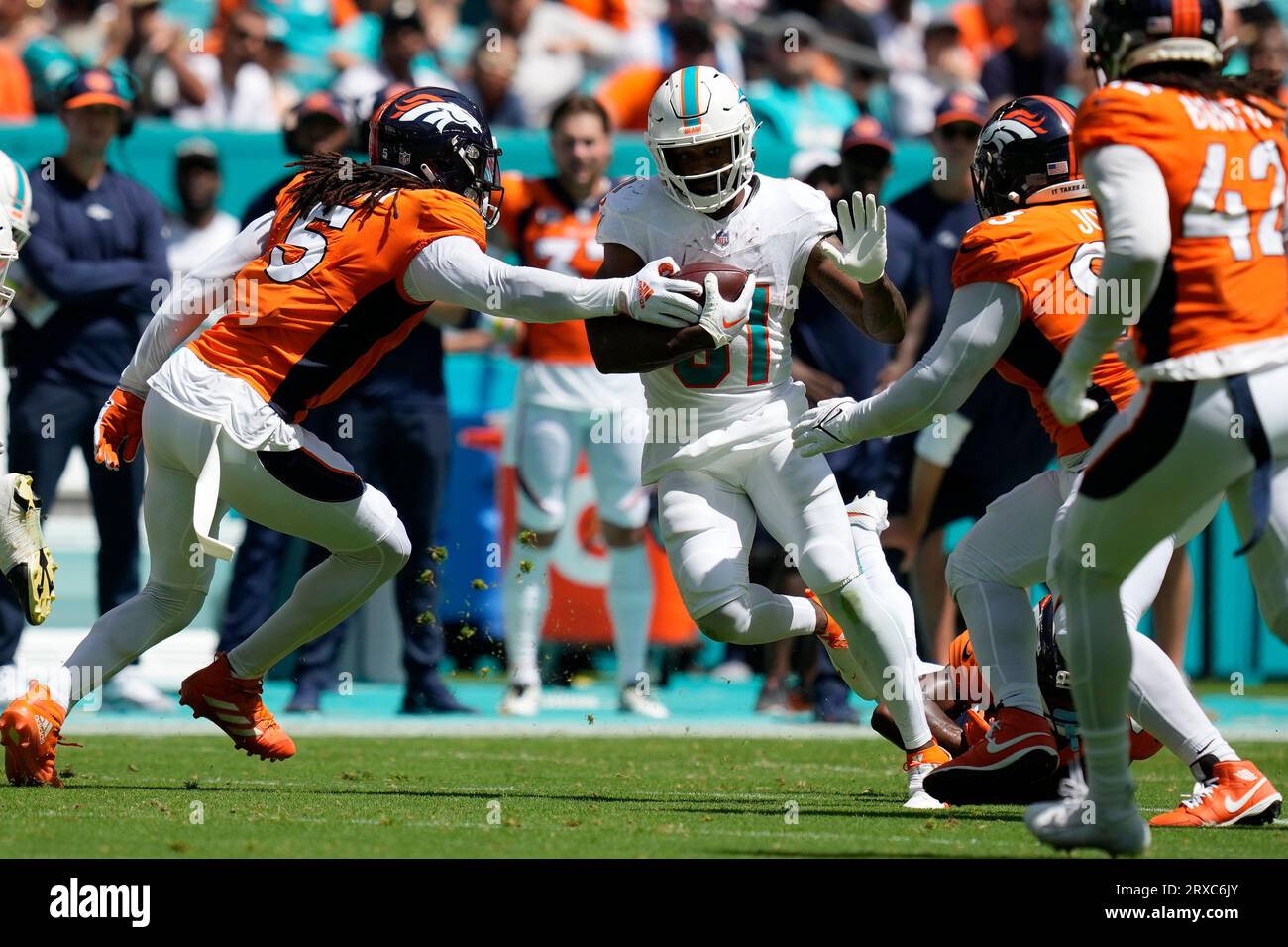 Denver Broncos linebacker Randy Gregory (5) attempts to stop Miami ...