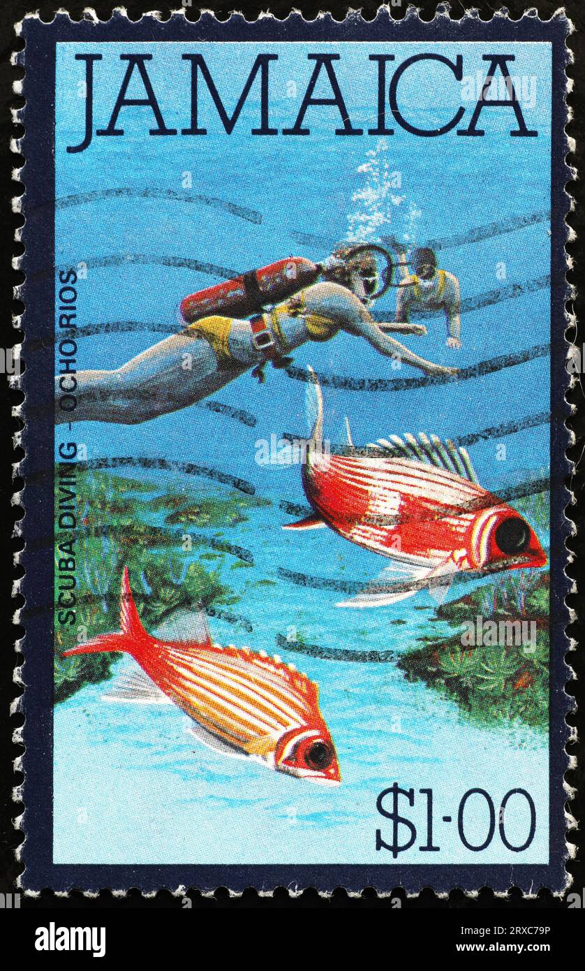 Scuba diving in Jamaica on postage stamp Stock Photo - Alamy