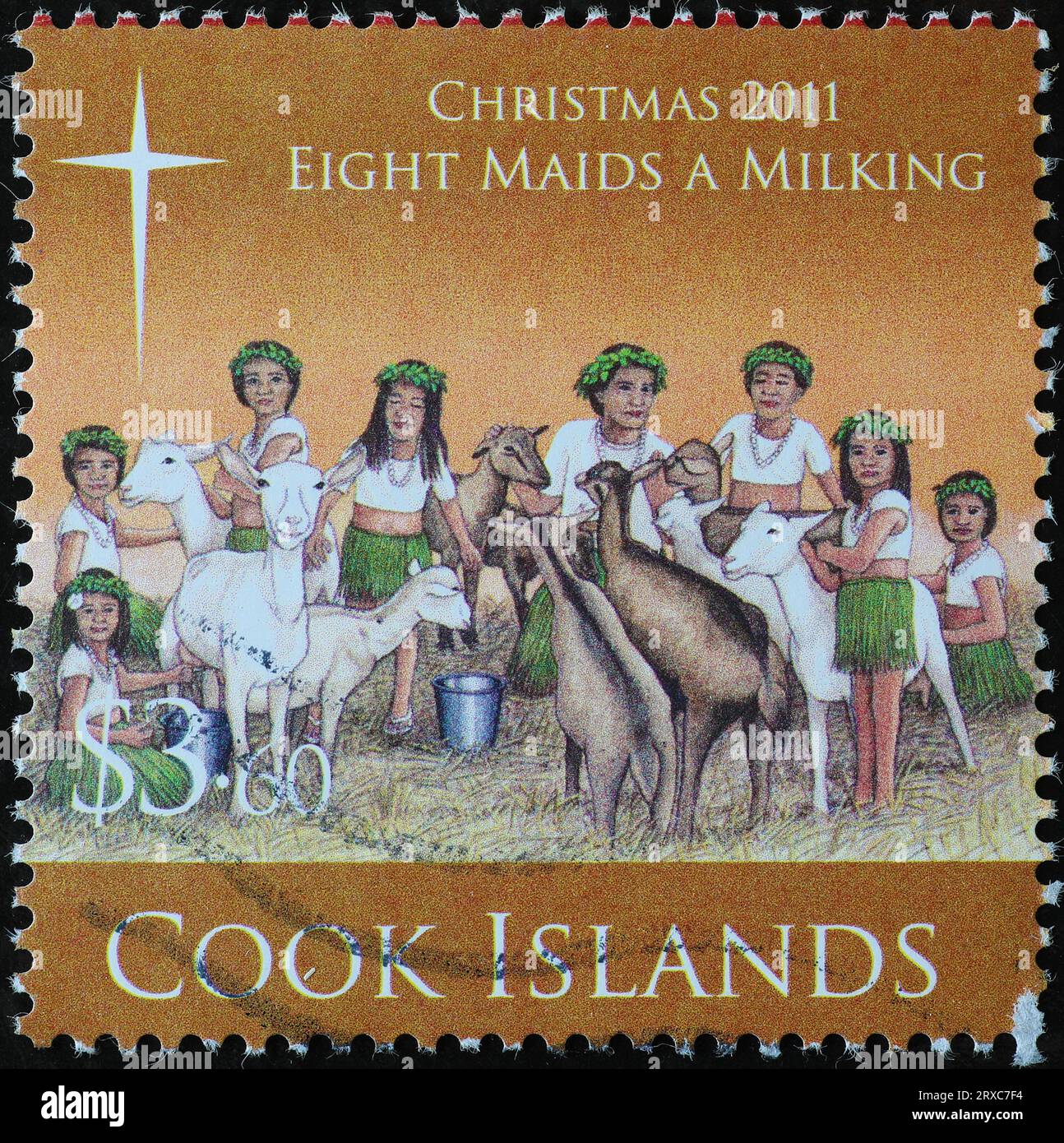 Twelve days of Christmas - 8 maids a milking on postage stamp of Cook ...