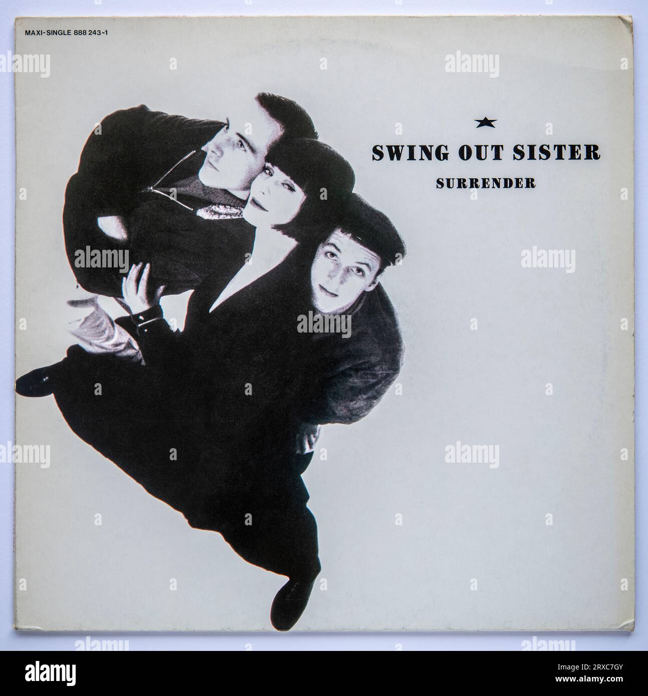 Picture cover of the 12 inch single version of Surrender by Swing Out Sister, which was released ...