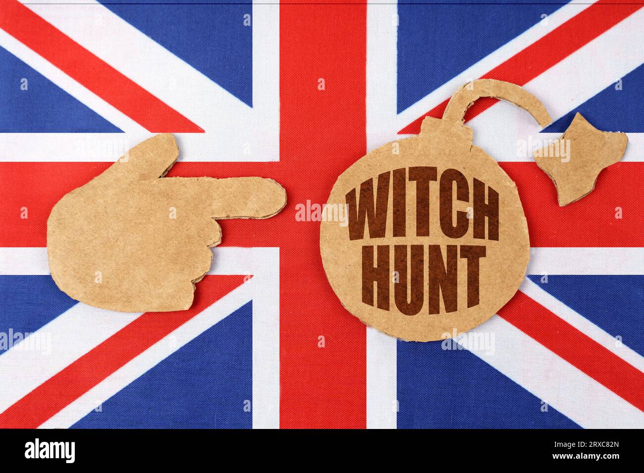 On the flag of Great Britain there is a bomb cut out of cardboard and a ...
