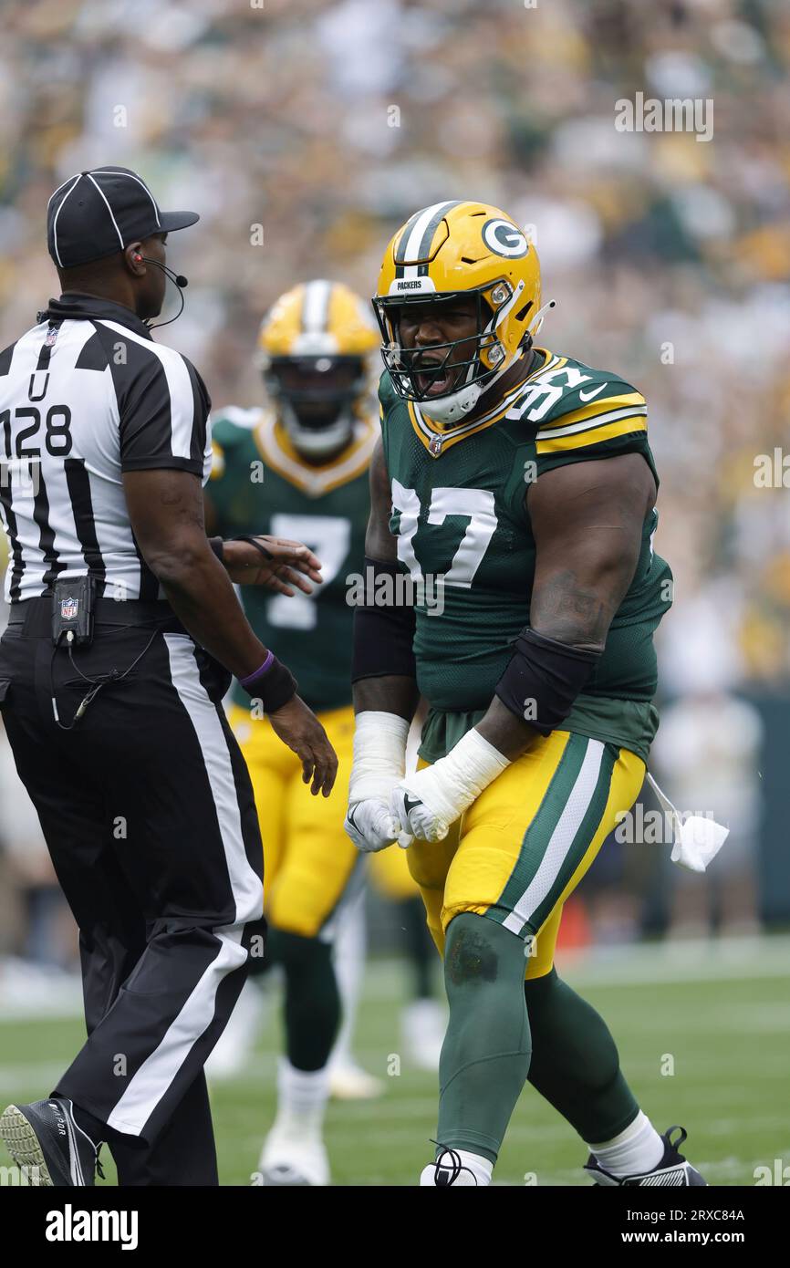 Green Bay Packers defensive tackle Kenny Clark (97) celebrates a sack ...