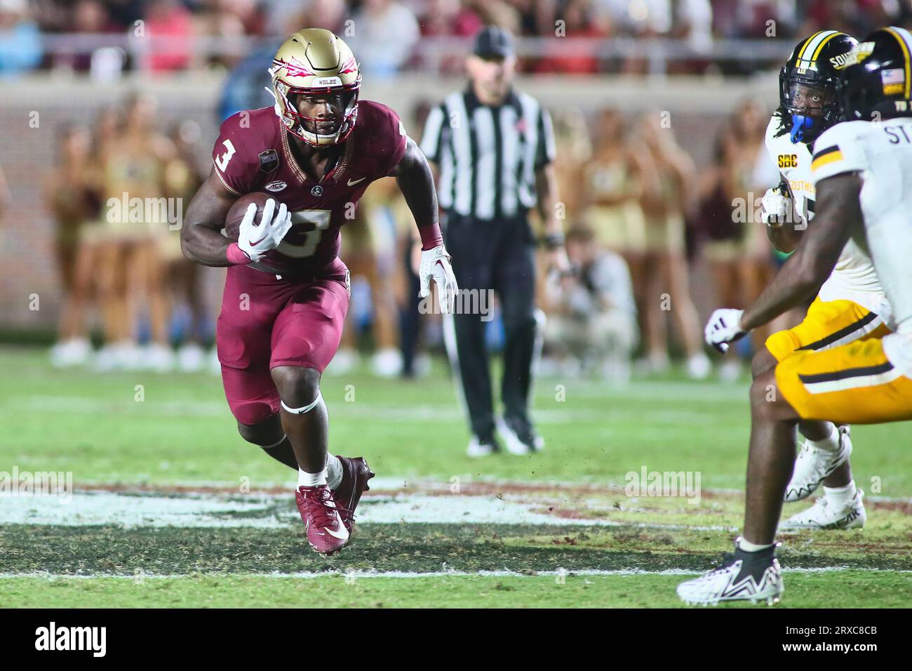 Florida State running back Trey Benson (3) runs in the third quarter of ...