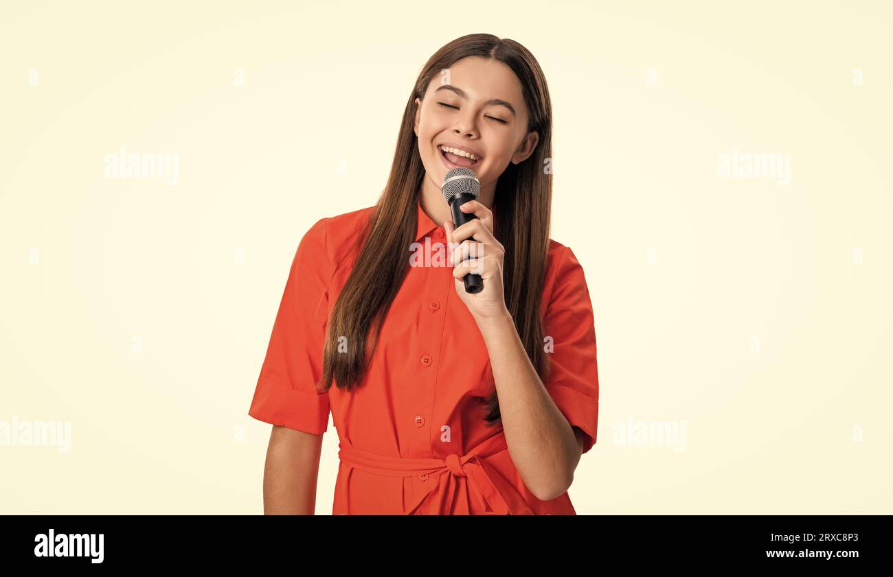 happy teen girl singer with singing microphone. photo of singer teen ...