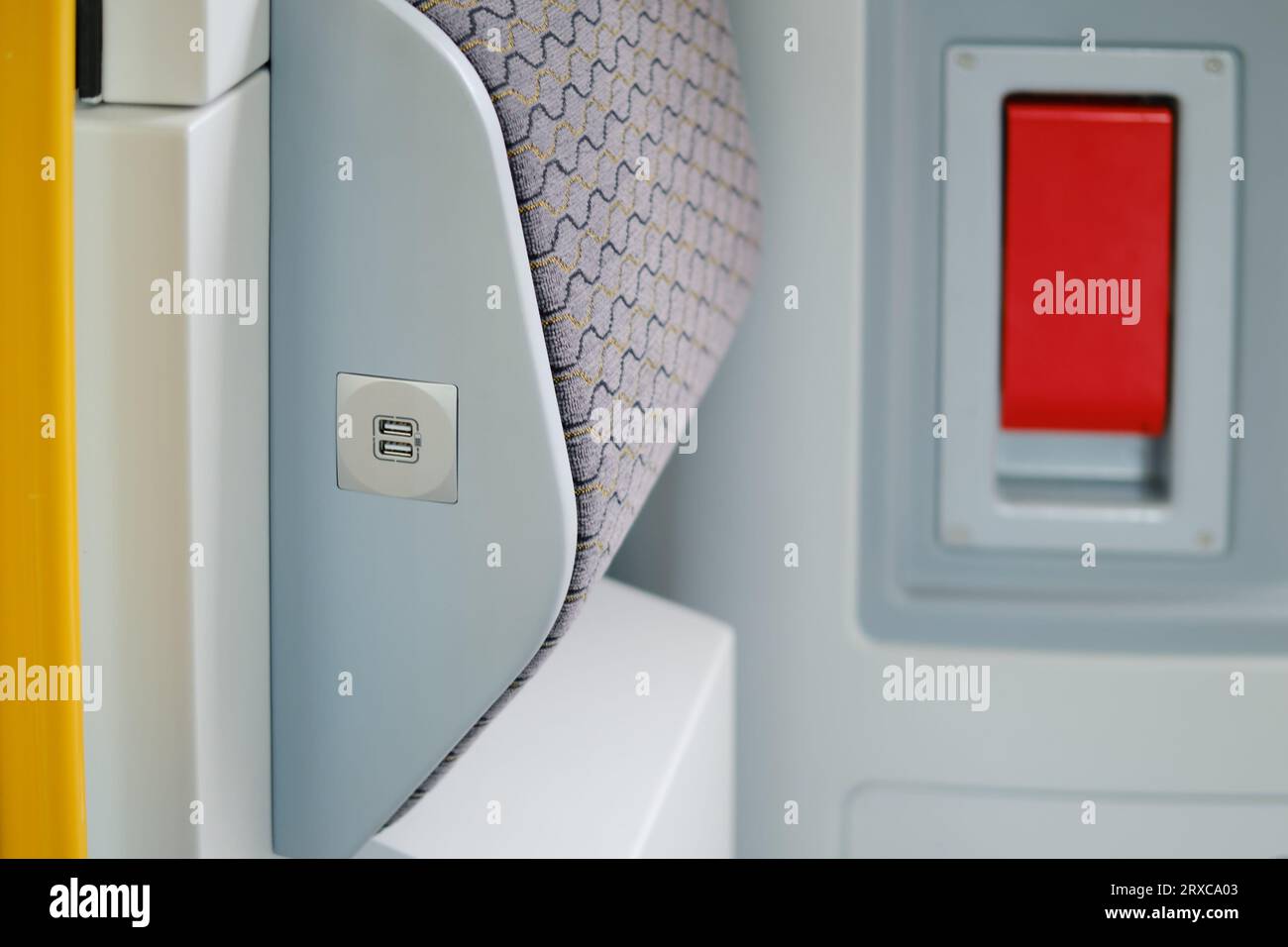USB port for charging a phone as an interior detail of public passenger ...