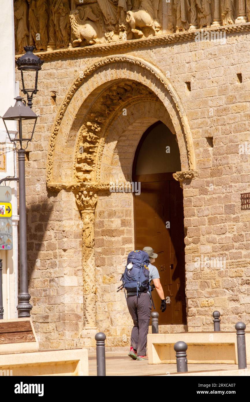 Pilgrims walking the Camino de Santiago pilgrimage route the way of St ...