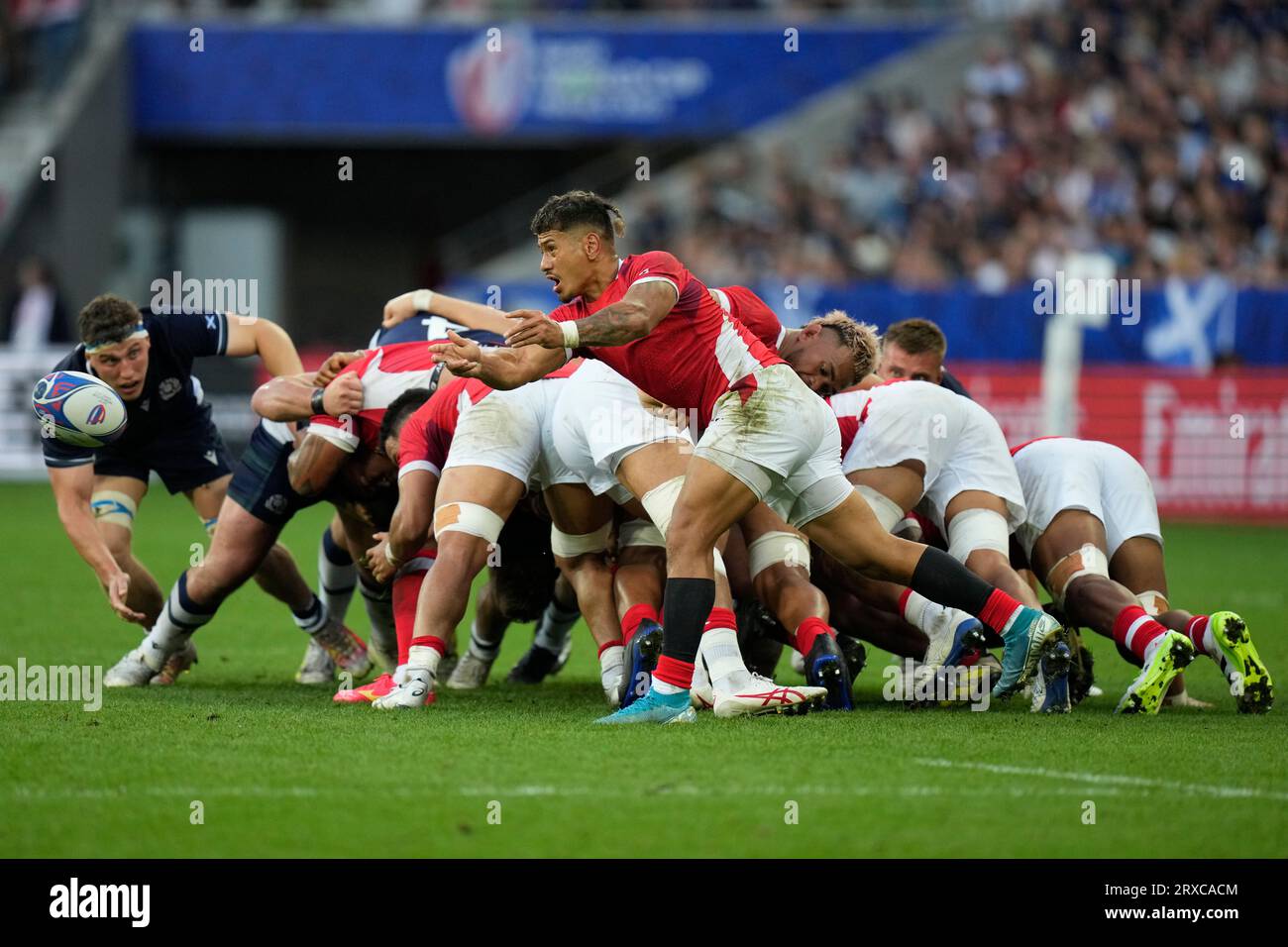 Tonga's Augustine Pulu passes the ball during the Rugby World Cup Pool ...