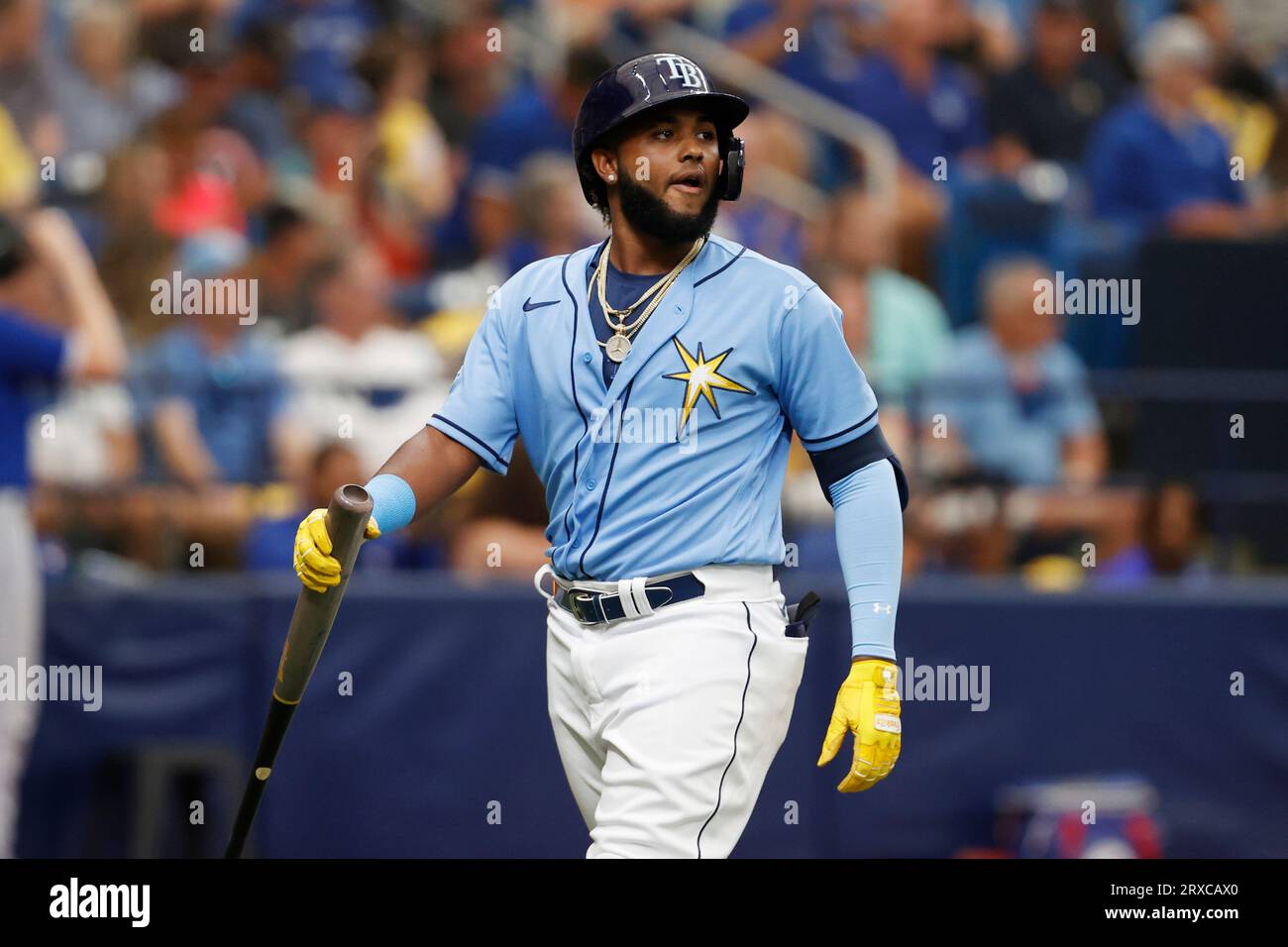 Tampa Bay Rays' Junior Caminero walks to the dugout after striking out ...