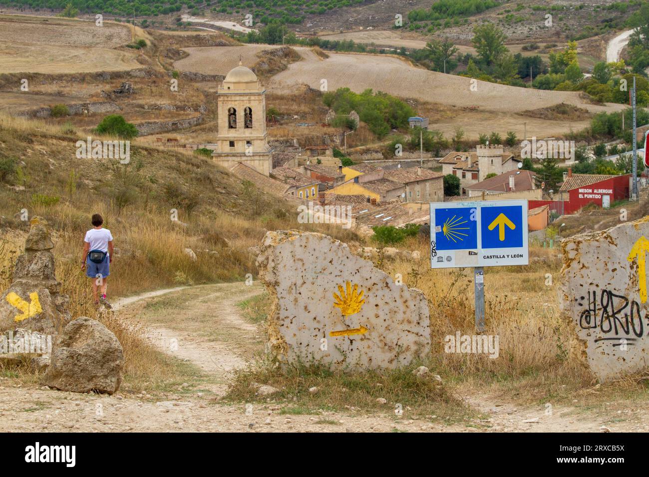 Pilgrims walking the Camino de Santiago pilgrimage route, the way of St ...