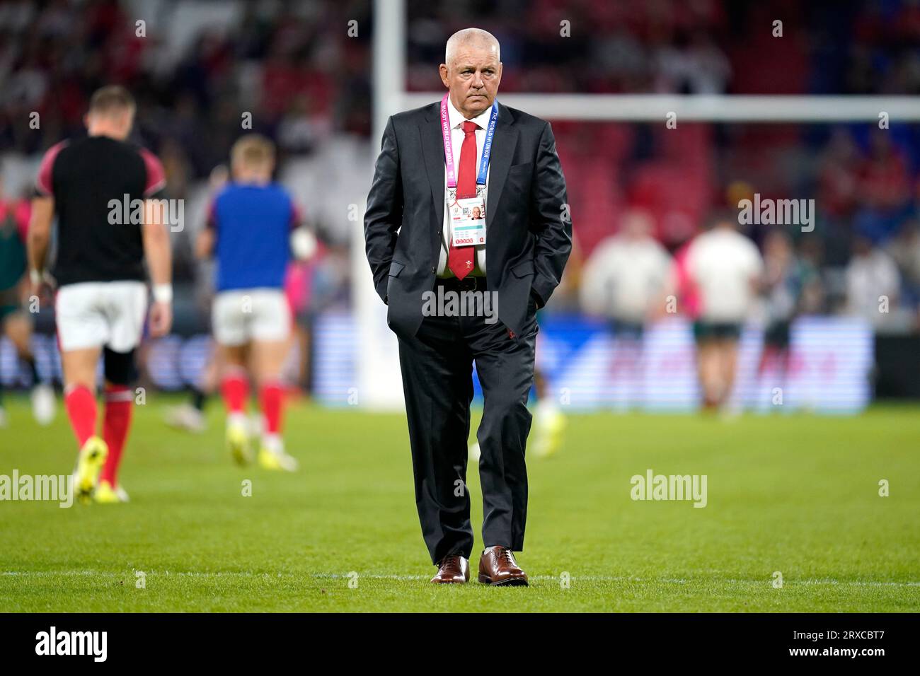 ***Editor Note: Information pixelated on lanyard*** Wales head coach ...