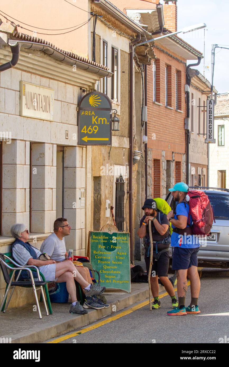 Pilgrims walking the Camino de Santiago pilgrimage route the way of St ...