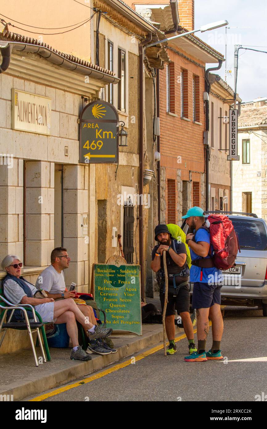 Pilgrims walking the Camino de Santiago pilgrimage route the way of St ...