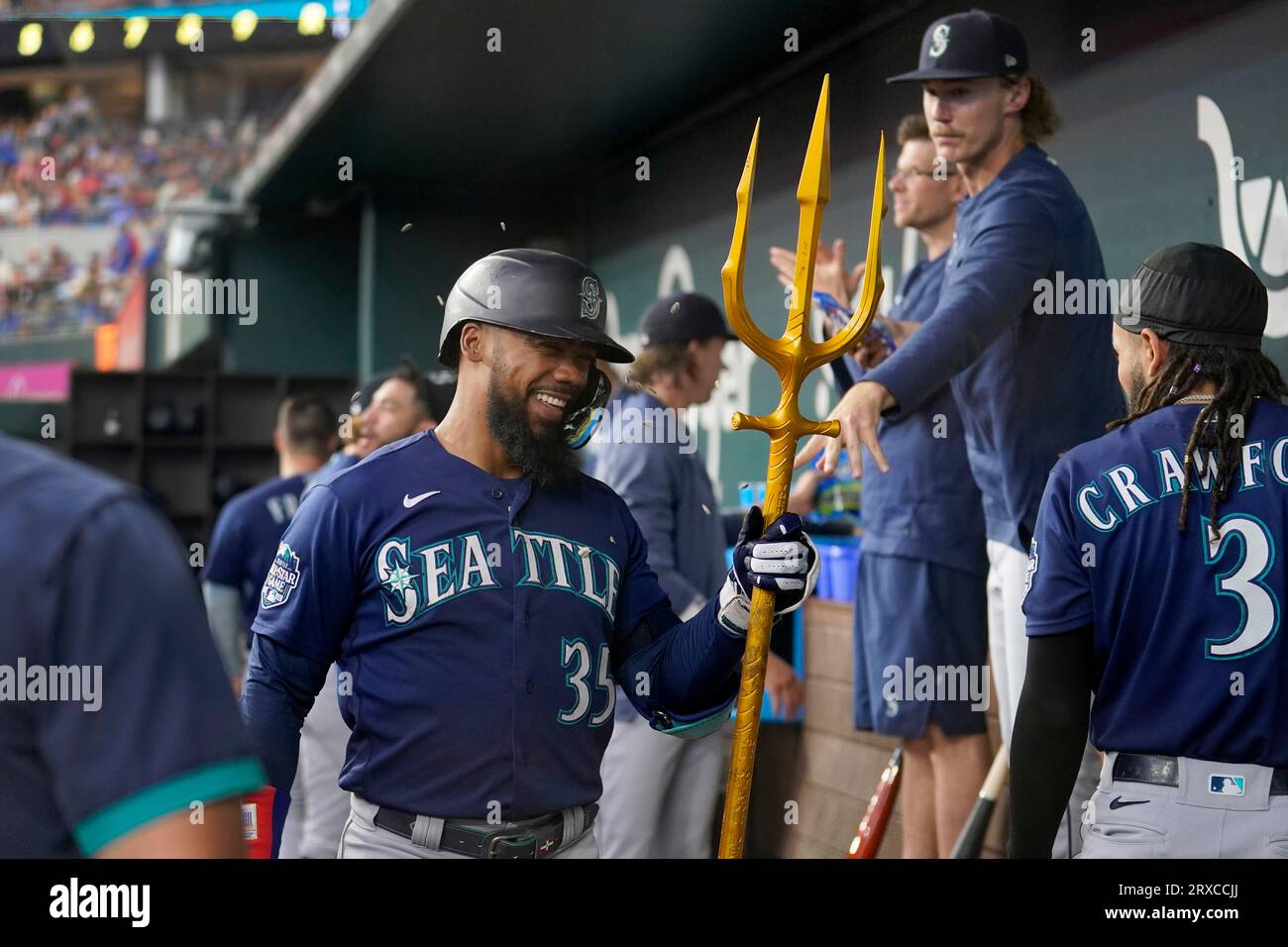 Seattle Mariners' Teoscar Hernandez (35) celebrates with teammates in ...