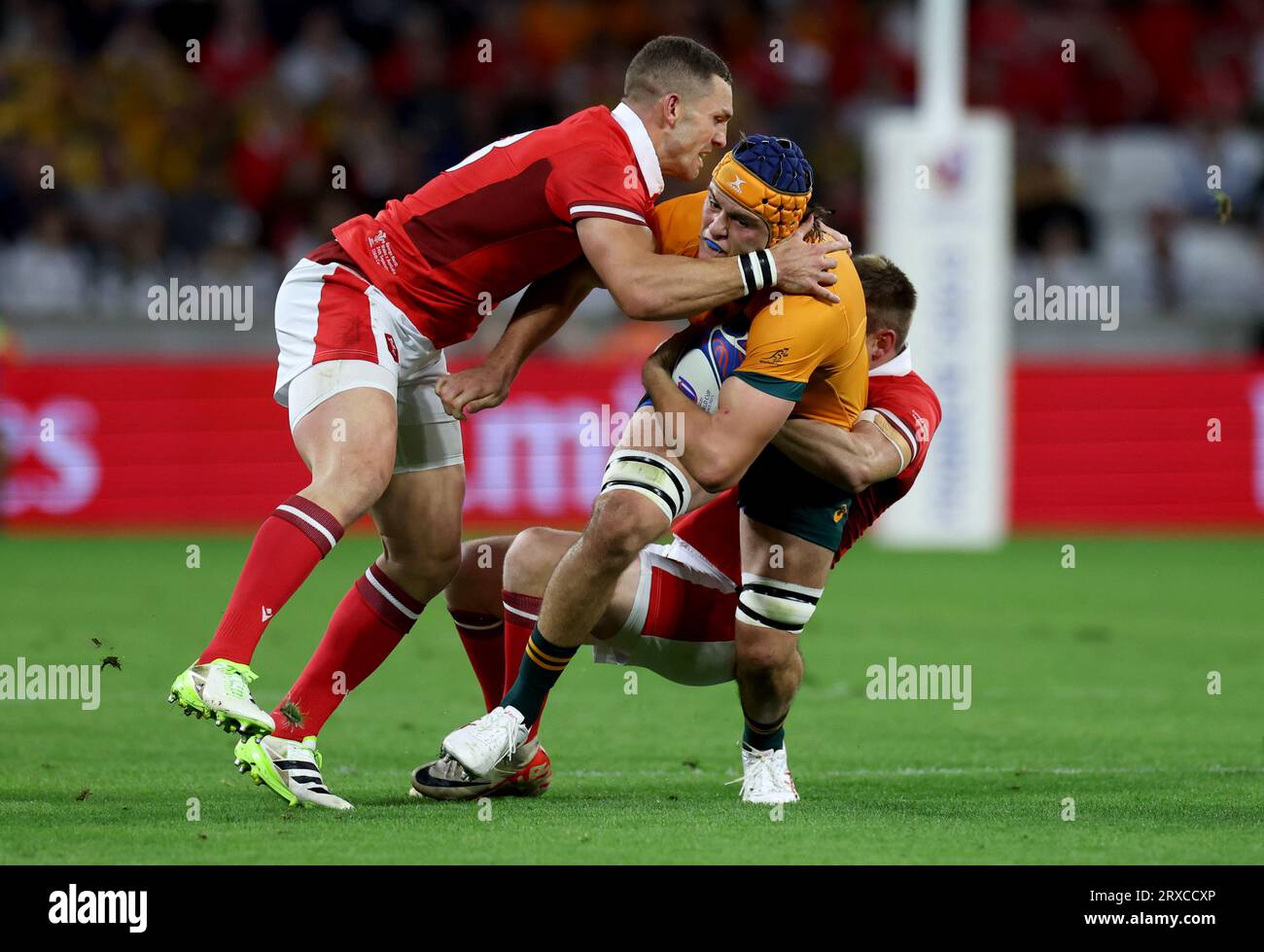 Australia's Tom Hooper is tackled by Wales' George North (left0 during ...