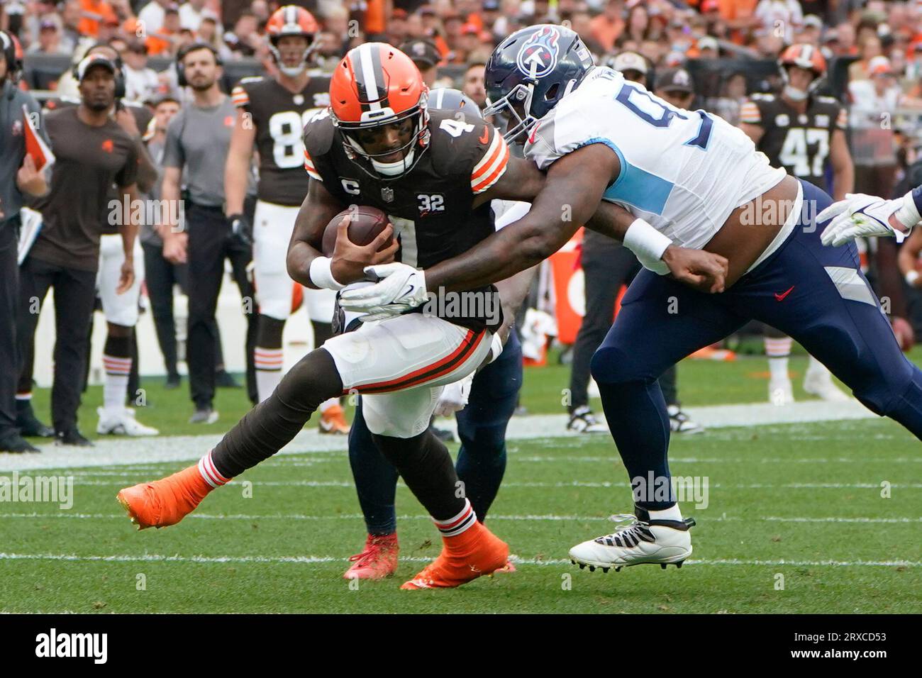 Cleveland Browns quarterback Deshaun Watson (4) is tackled by Tennessee ...