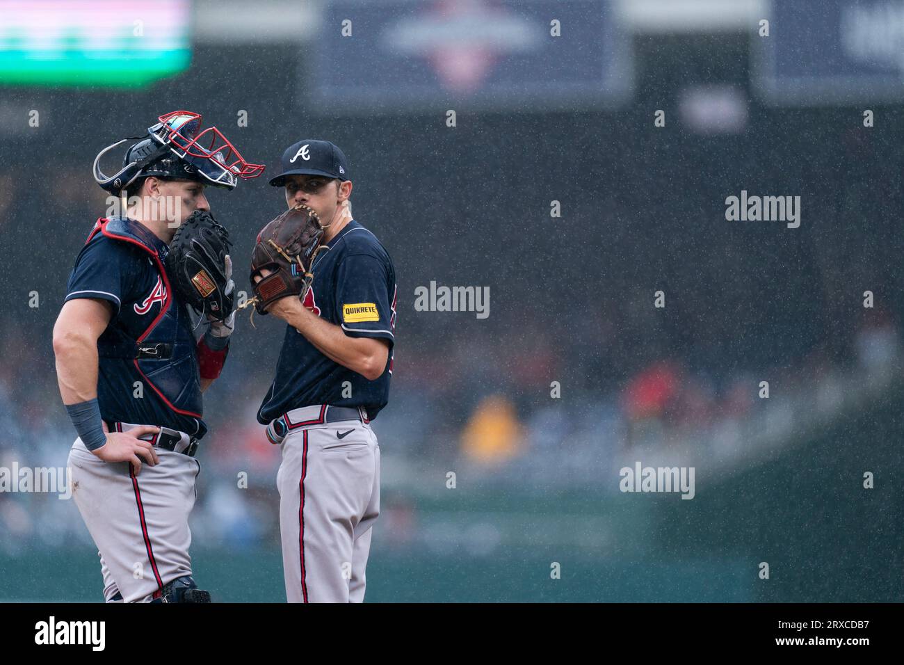 Atlanta Braves catcher Sean Murphy, left, and starting pitcher Allan Winans, right, talk on the ...