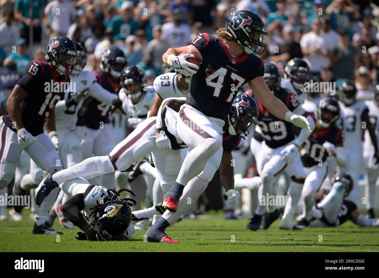 Houston Texans fullback Andrew Beck (47) returns a kickoff for a ...