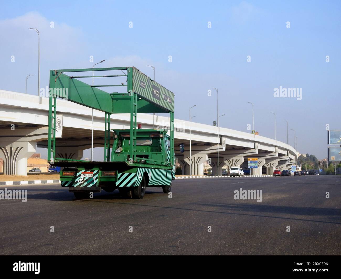 Cairo, Egypt, September 19 2023: Electric vehicle mounted lifting hoist ...