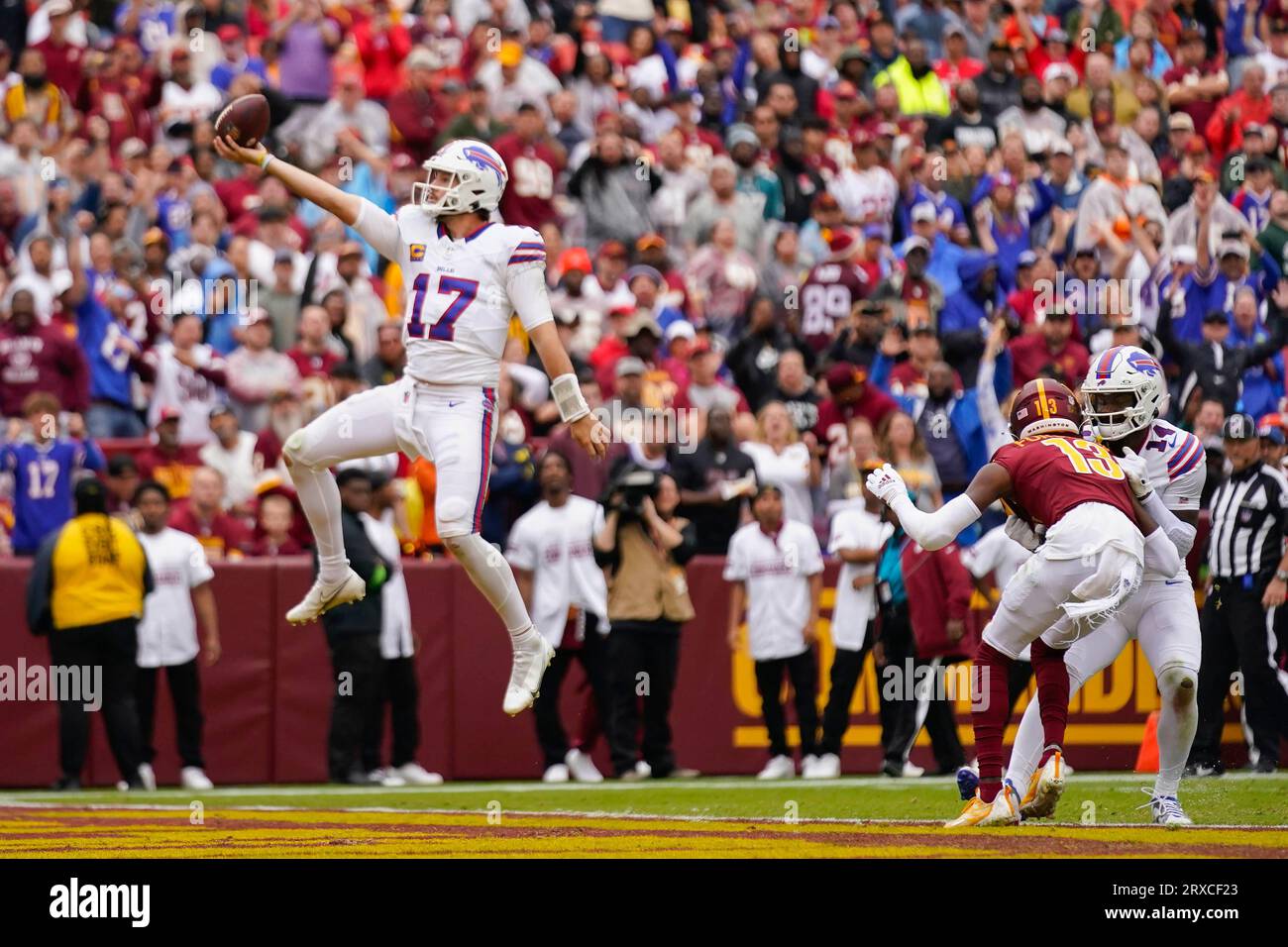 Buffalo Bills quarterback Josh Allen (17) leaping into the endzone to ...