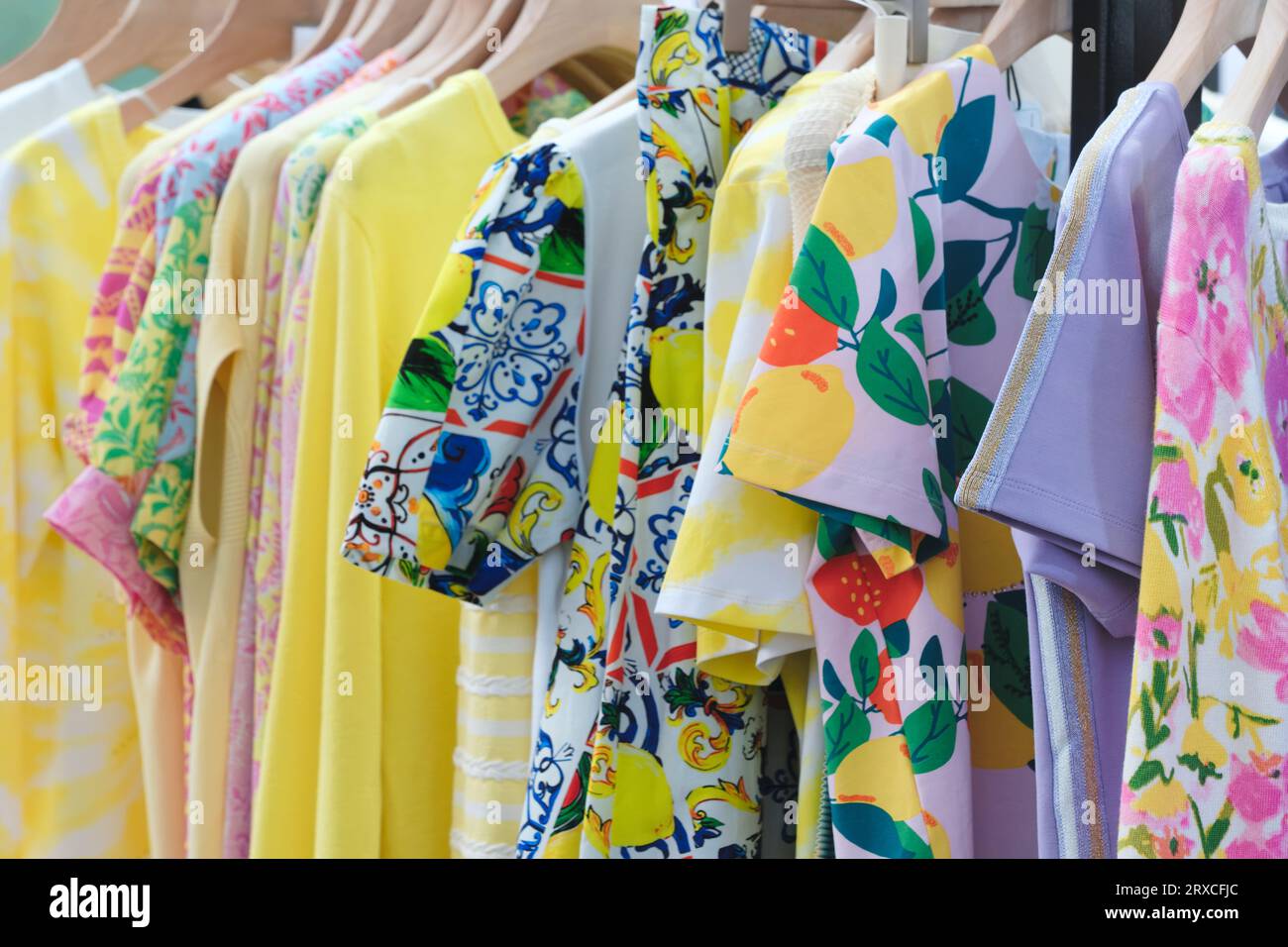 Changing room yellow shirt hi-res stock photography and images - Alamy