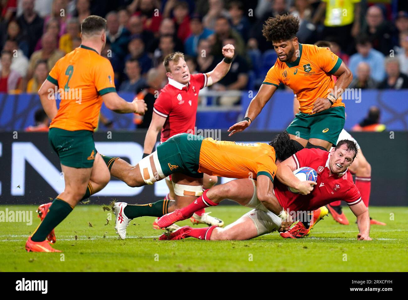 Wales' Ryan Elias (right) is tackled by Australia's Robert Leota during ...