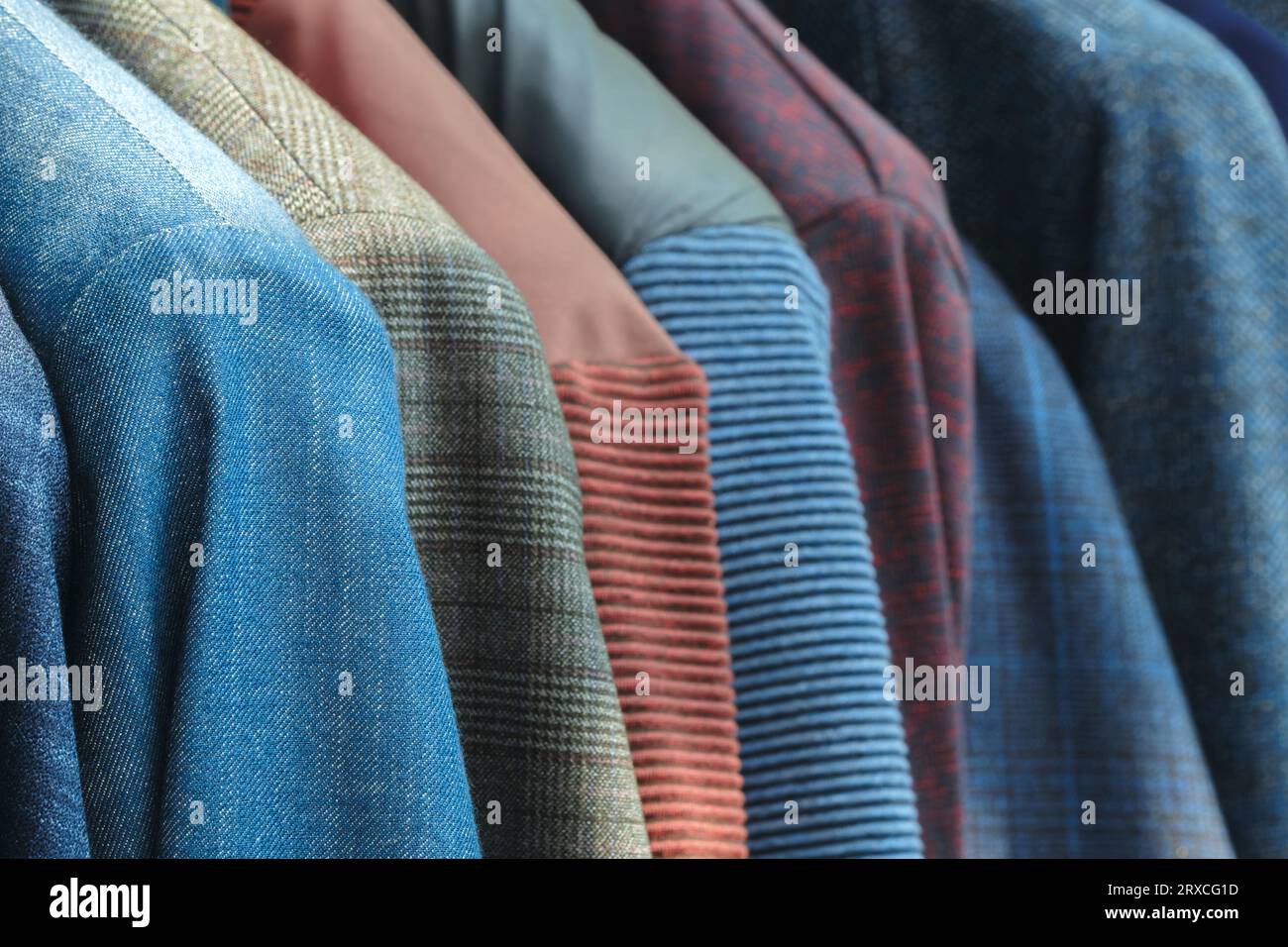 Racks with different men's suits in a men's clothing boutique Stock ...