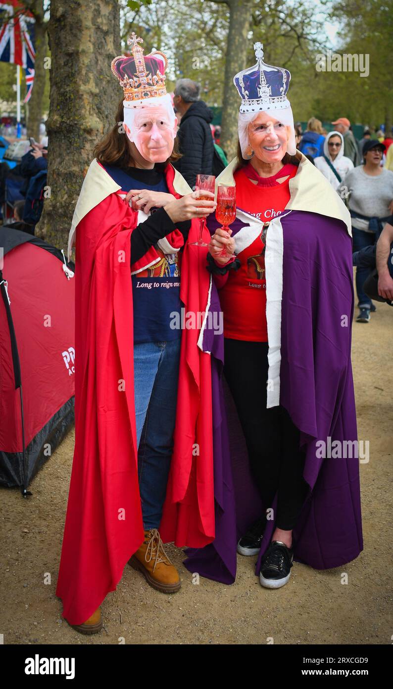 Members of the public dressed up and wearing mask King Charles and ...