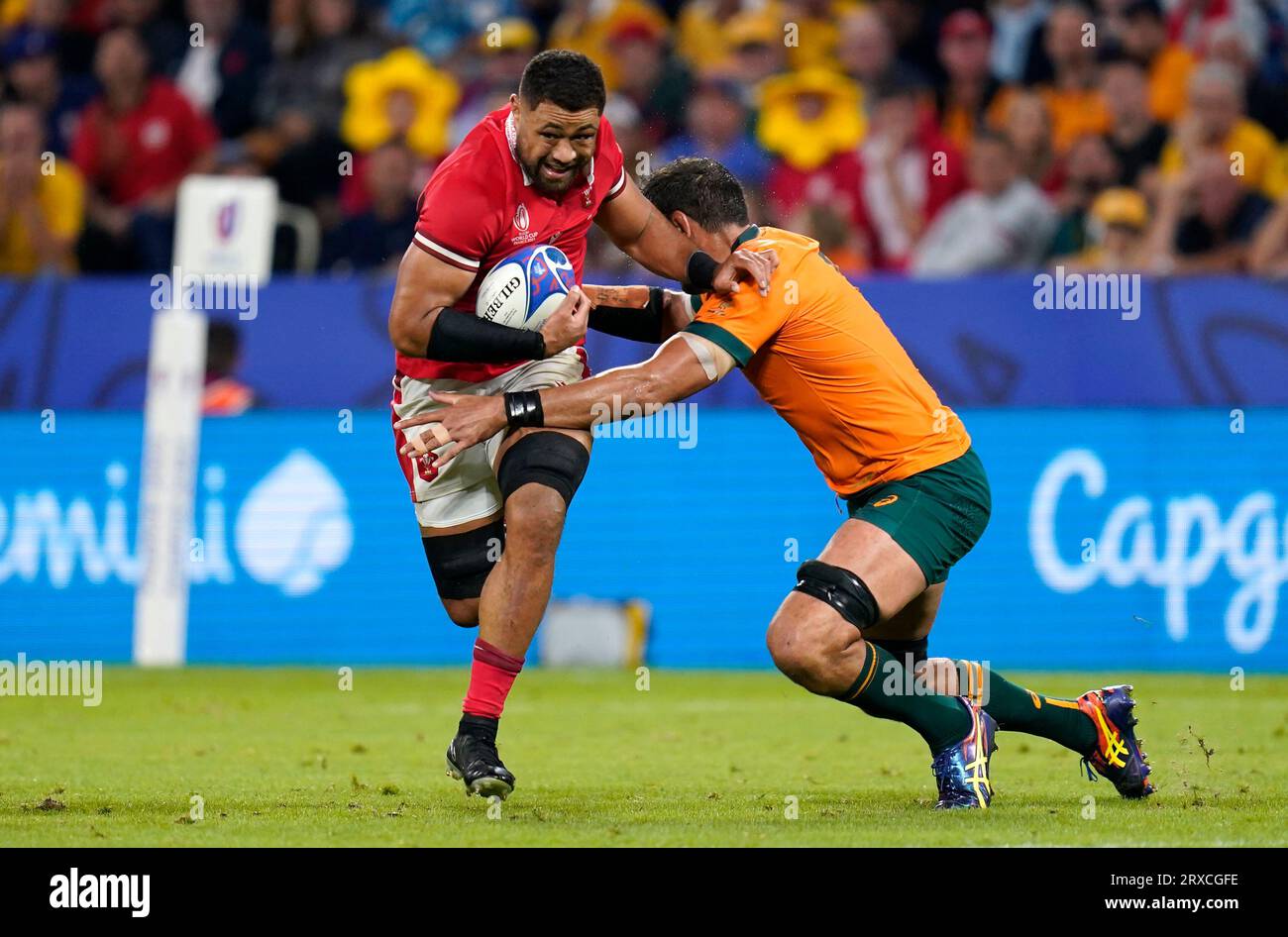 Wales' Taulupe Faletau (left) attempts to get past Australia's Richie ...