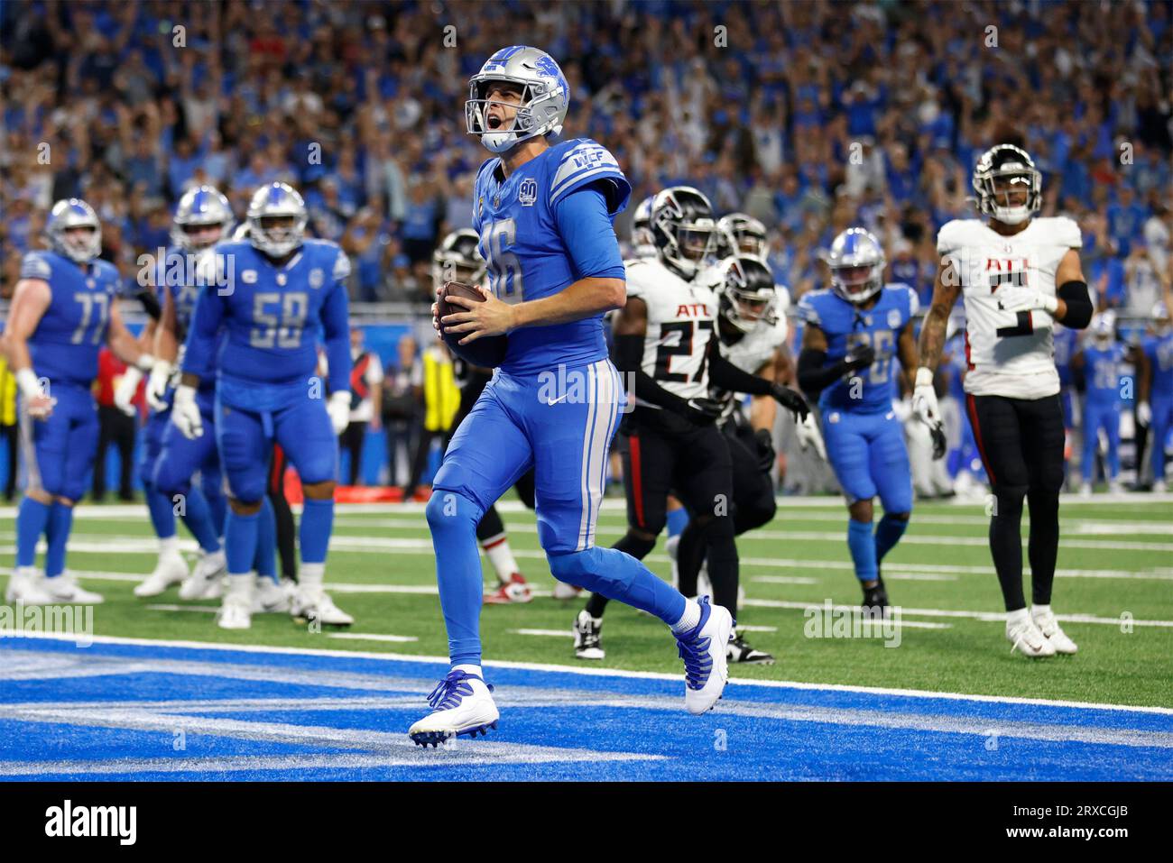 Detroit Lions quarterback Jared Goff (16) scores a touchdown against ...