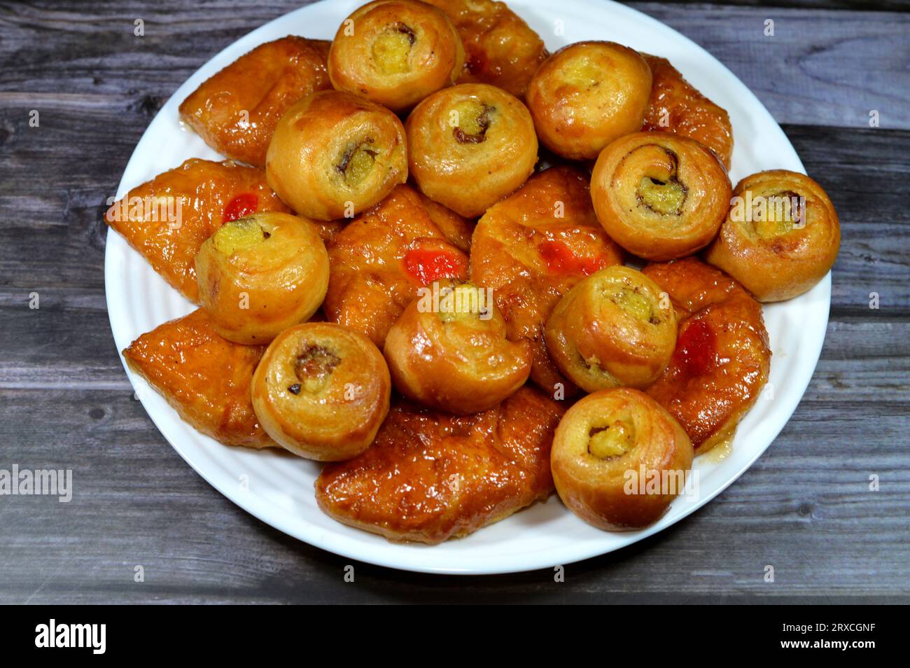 Background of Mini baked Danish pastry stuffed and topped with honey ...