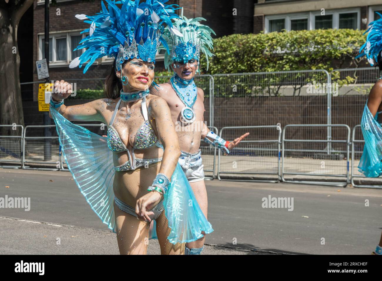 NOTTING HILL, LONDON, ENGLAND - 28 August 2023: Performers wearing ...