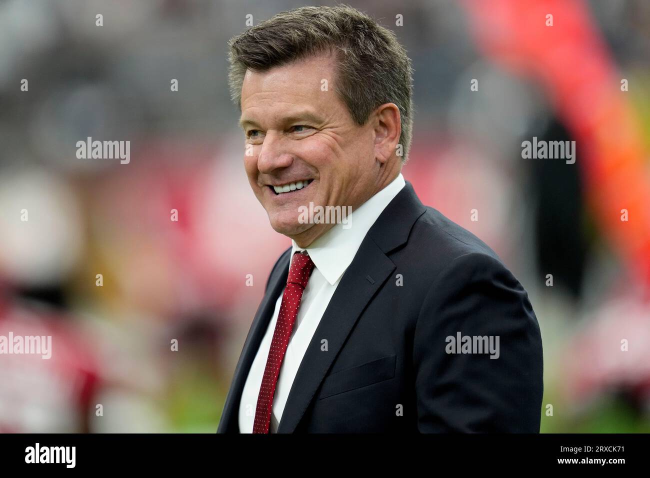 Arizona Cardinals owner Michael Bidwill walks on the turf before an NFL ...