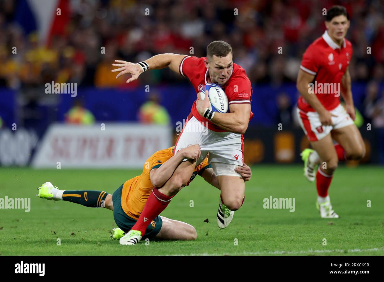 Wales' George North is tackled by Australia's Carter Gordon during the ...