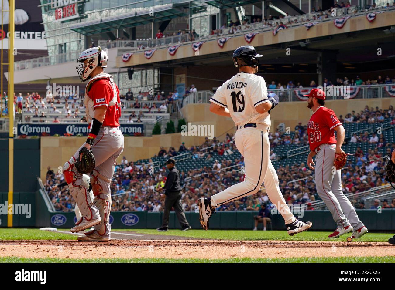 Minnesota Twins' Alex Kirilloff (19) runs past Los Angeles Angels ...