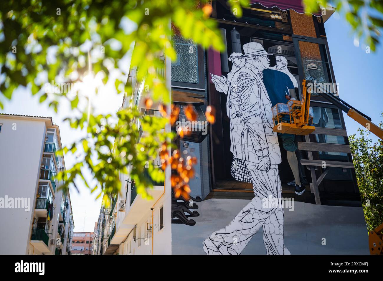 French artist Taroe working at Asalto International Urban Art Festival ...