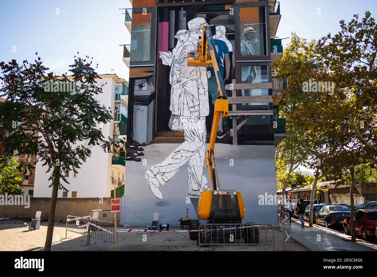 French artist Taroe working at Asalto International Urban Art Festival ...