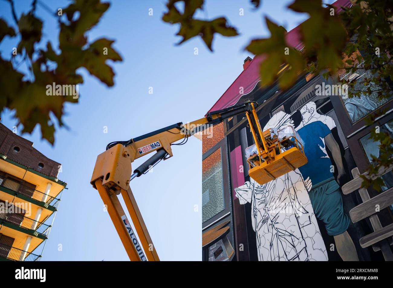 French artist Taroe working at Asalto International Urban Art Festival ...