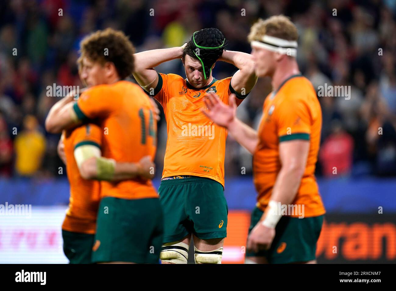 Australia's Nick Frost (centre) looks dejected following defeat in the ...