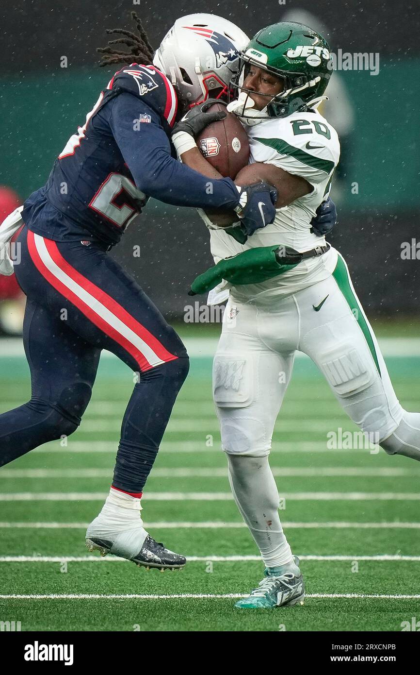 New England Patriots safety Kyle Dugger (23) tackles New York Jets ...