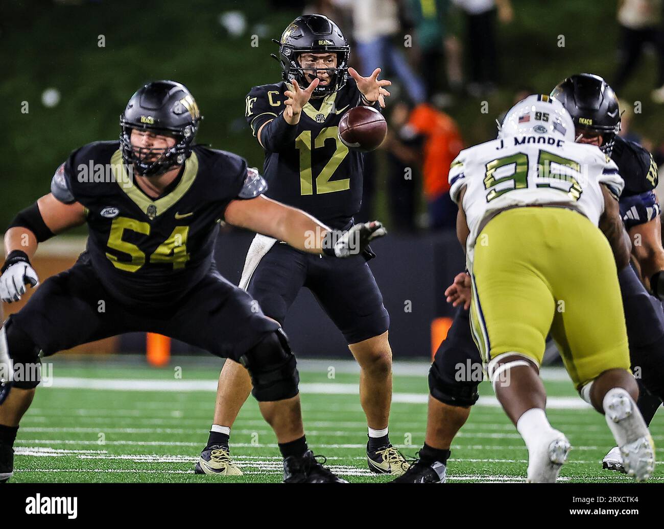 September 23,2023: Wake Forest sophomore Mitch Griffis (12) takes hike ...