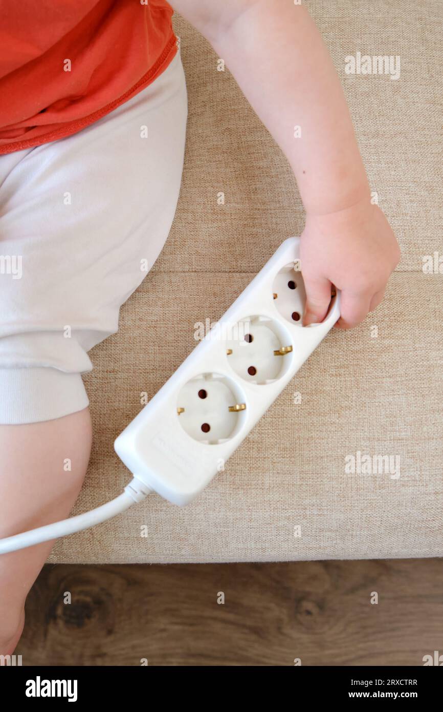 Baby boy playing cable wire hi-res stock photography and images - Alamy