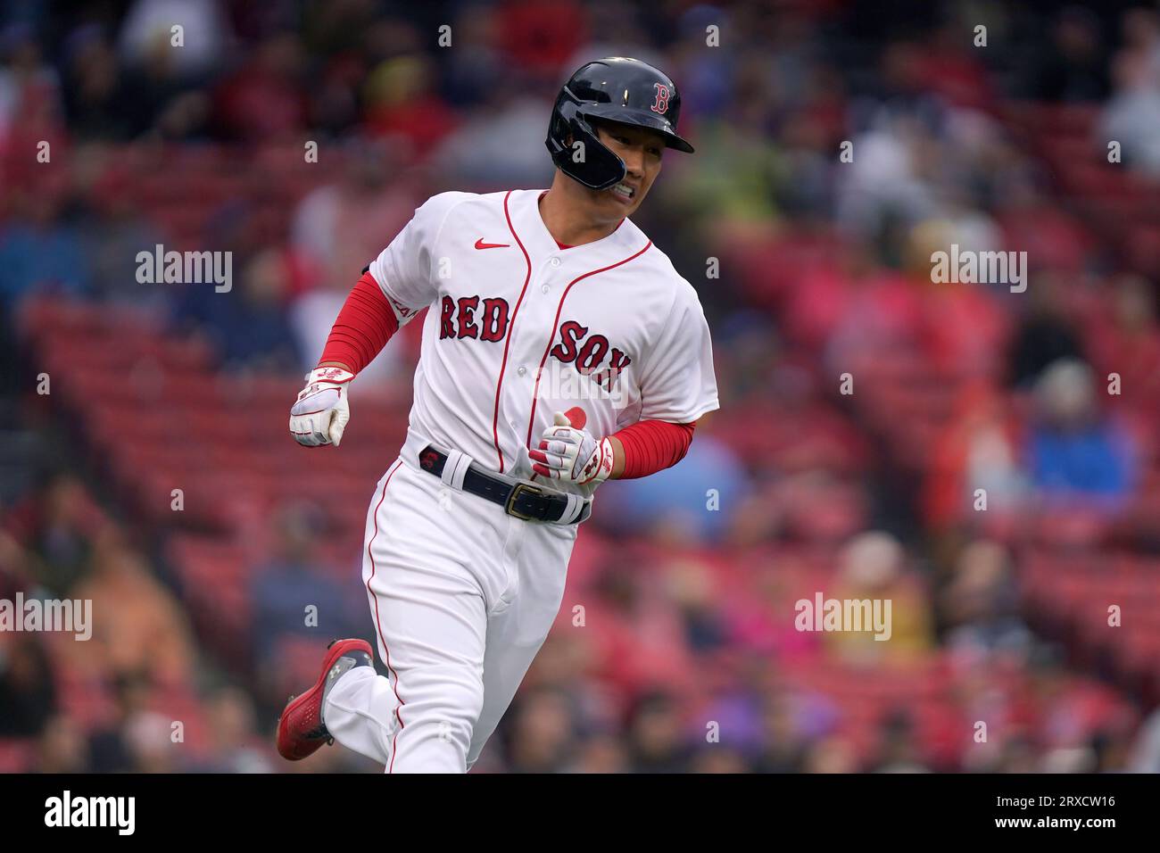 Boston Red Sox's Masataka Yoshida runs toward first as he lines out to ...